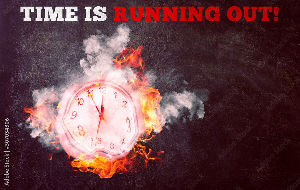 Time is running out concept shows clock that is burning up with flames ...