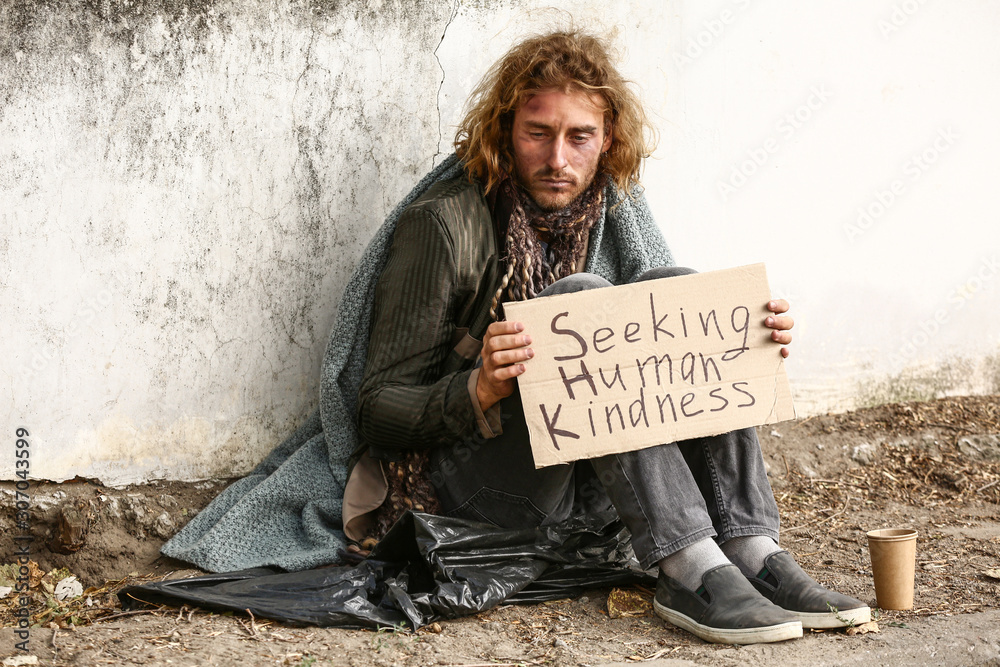 Portrait of poor homeless man outdoors Stock Photo | Adobe Stock