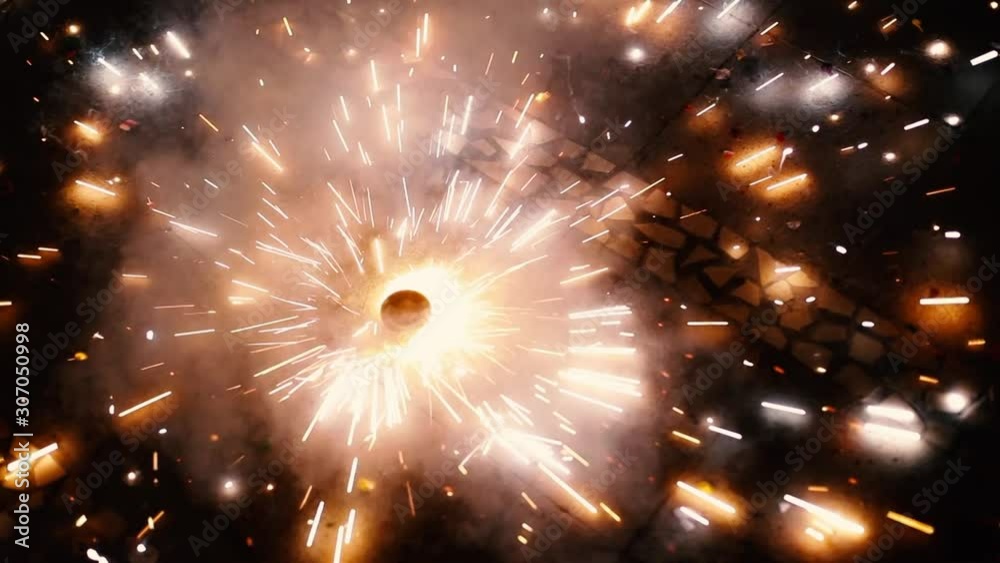 Vidéo Stock Cracker sparkles spinning isolated on a black background ...