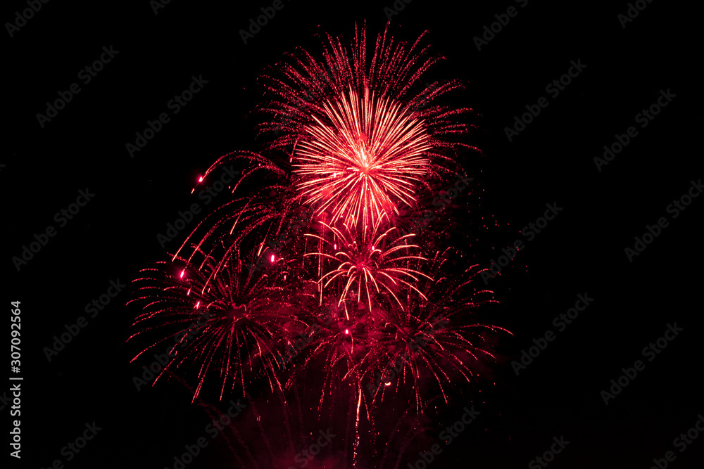 Red fireworks on black background for winter and new year festivals ...
