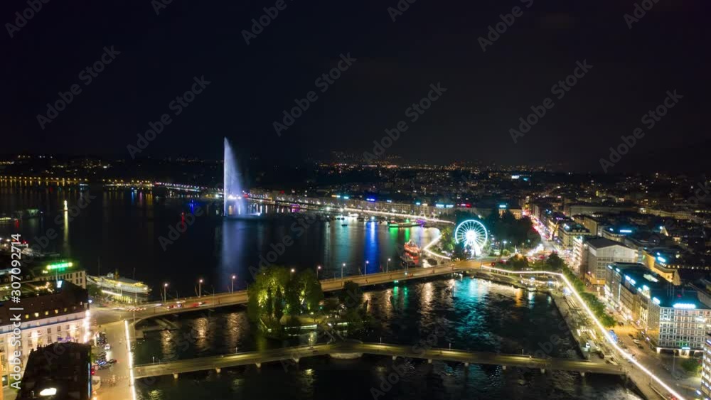 sunset sky night illuminated flight over geneva city lakeside aerial ...