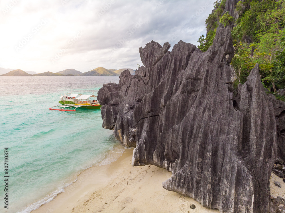 Aerial view of Banol Beach on paradise island, Coron, Palawan ...