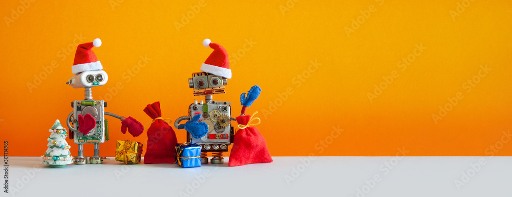 Toy robots Santas with a bunch of New Year's holiday gifts and a ...