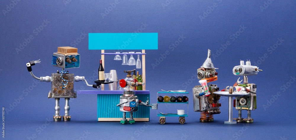 Robotic bar service. Toy robot bartender tray wine bottle and glasses ...