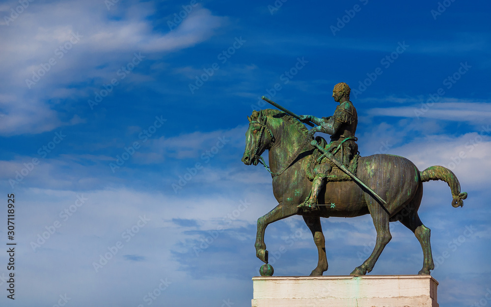 Gattamelata bronze equestrian statue among clouds, in the historic ...
