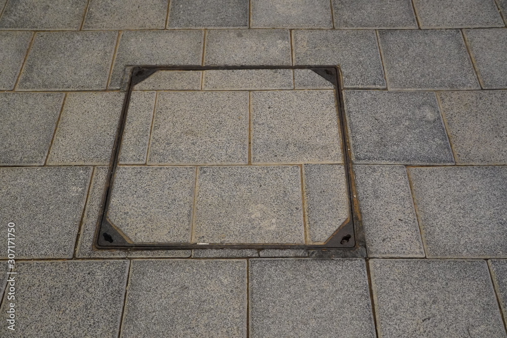 Hidden square manhole cap, grunge manhole cover. Cast iron manhole ...