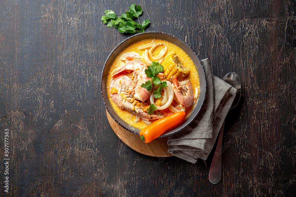 Peruvian seafood soup Chupe de Camarones in gray bowl, top view Stock ...