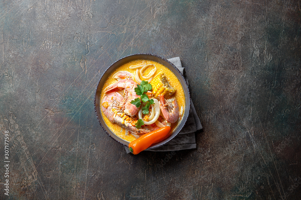 Peruvian seafood soup Chupe de Camarones in gray bowl, top view Stock ...