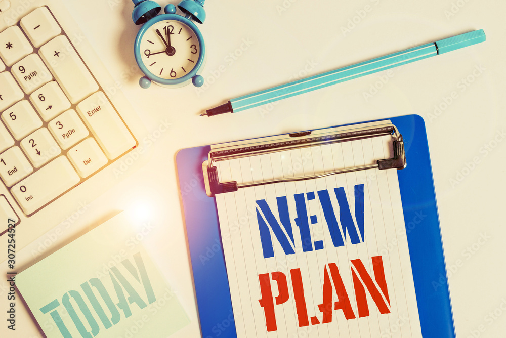 Writing note showing New Plan. Business concept for Start of a detailed ...