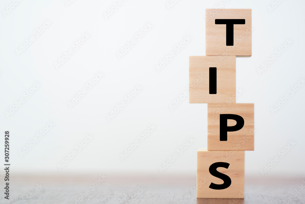 Tips written on wooden cubes Stock Photo | Adobe Stock