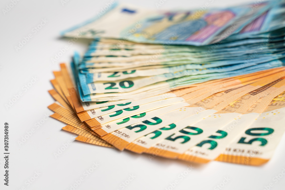 20 and 50 euro money note bill spread on white background Stock Photo ...