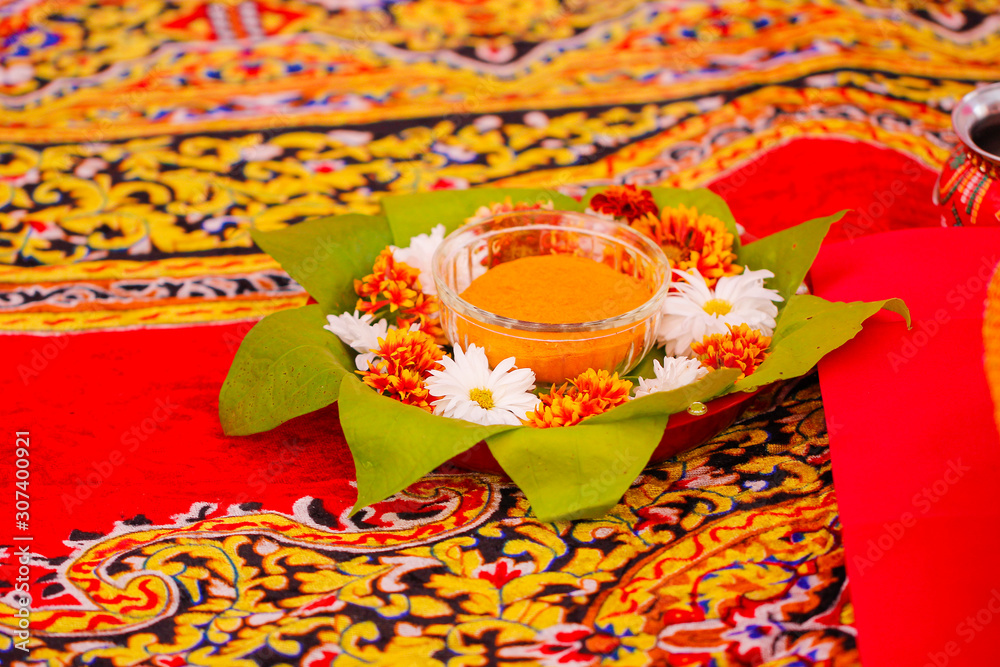 Traditional wedding ceremony in Hinduism: Turmeric in glass bowl for ...