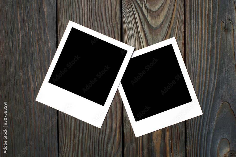 Two square blank photocards on dark wooden background Stock Photo ...