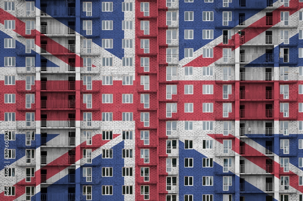 Great britain flag depicted in paint colors on multi-storey residental ...