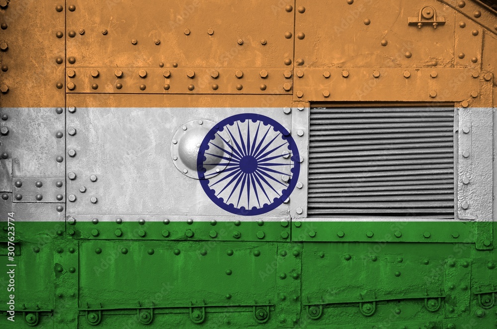 India flag depicted on side part of military armored tank closeup. Army ...