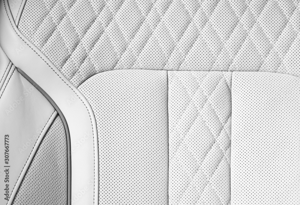 Modern luxury Car white leather interior. Part of perforated leather ...