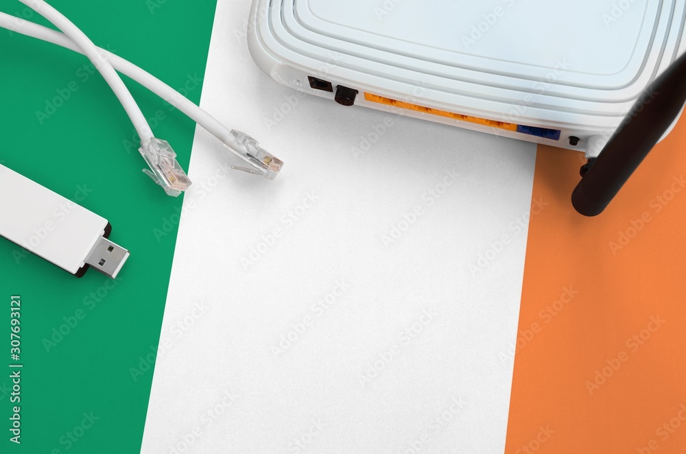 Ireland flag depicted on table with internet rj45 cable, wireless usb ...