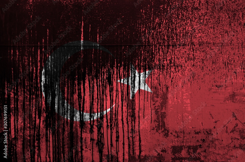 Turkey flag depicted in paint colors on old and dirty oil barrel wall ...