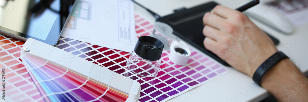 Test print paper page with colour test design fantail and magnifying ...