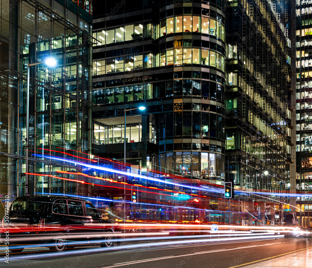 Busy city street at night with light streaks from vehicles Stock Photo ...
