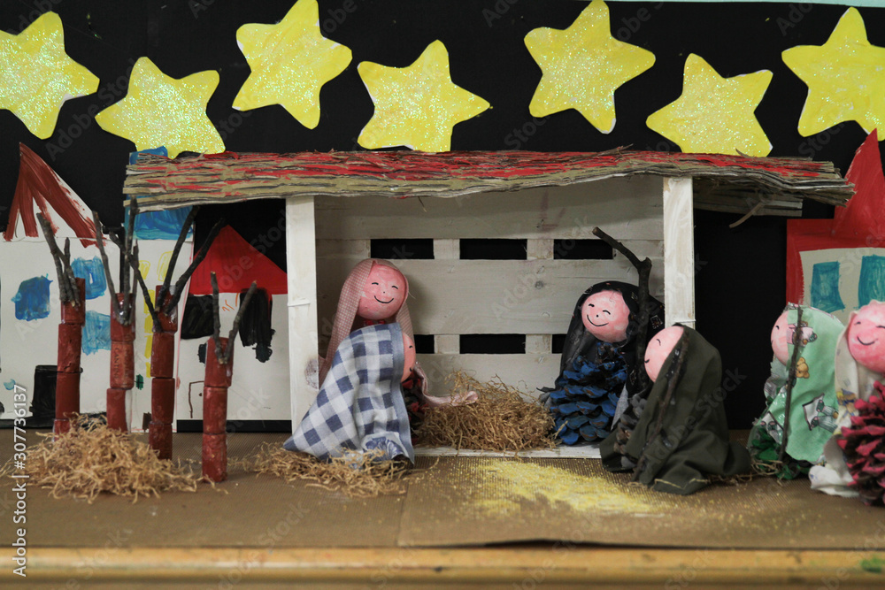 Realistic christmas nativity scene with figurines including Jesus and ...