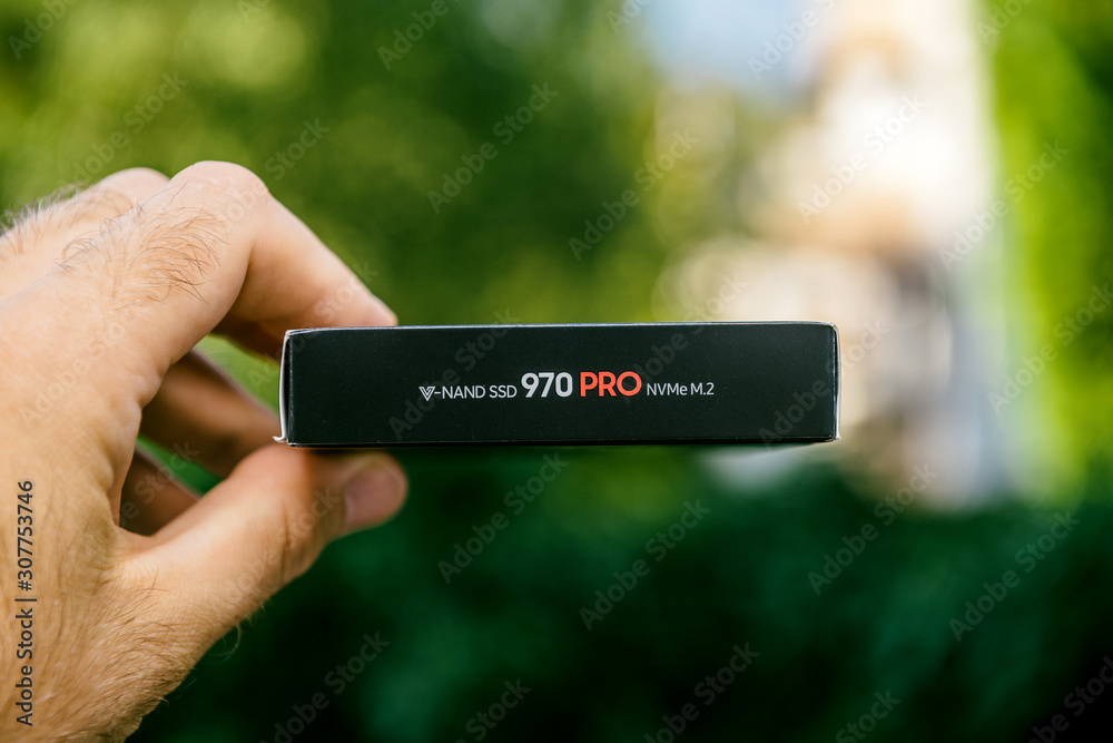 PARIS, FRANCE - AUG 3, 2018: Man hand holding packaging box of NVME ...