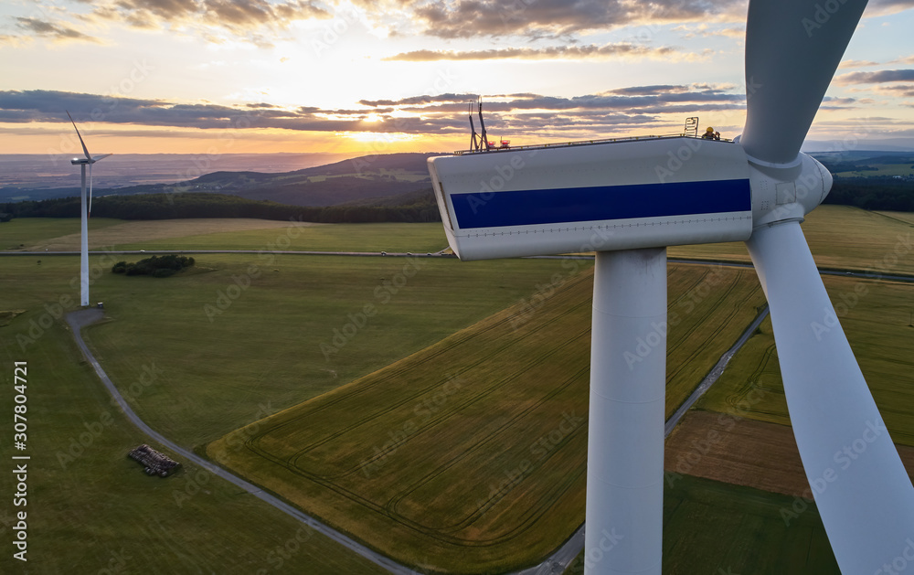 Aerial, close up view of wind turbine power plant.. maintenence of wind ...