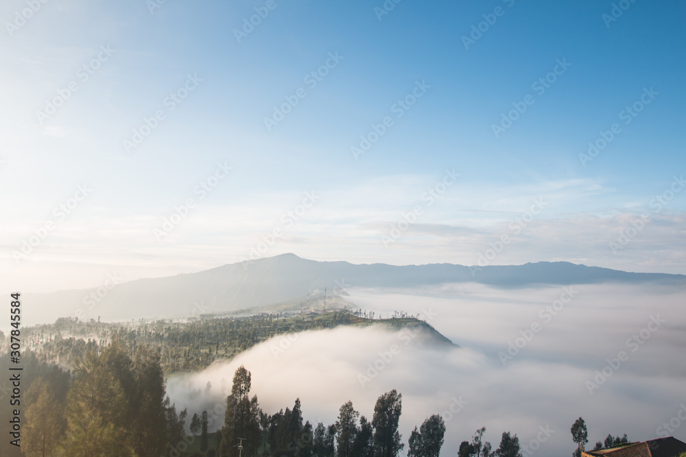 Volcano Bromo at sunset time background near Cemoro lawang village at ...