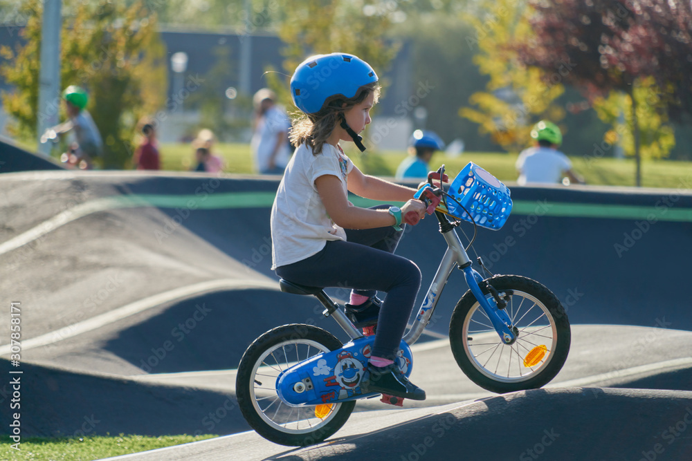 The bike lane for children. Children have fun on the race track. A ...