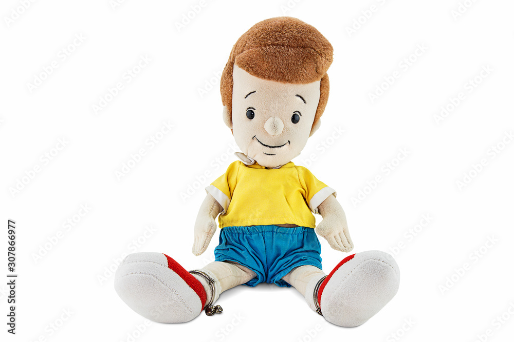 Plush little boy doll isolated on white background with clipping path ...