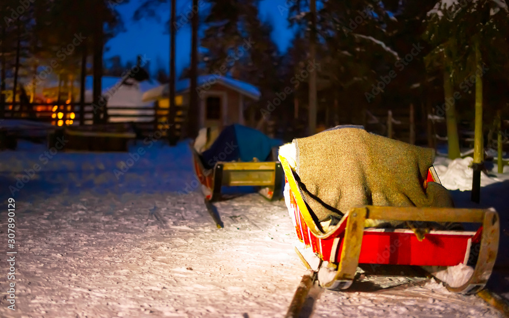 Reindeer sleigh in night Finland in Rovaniemi at Lapland farm ...
