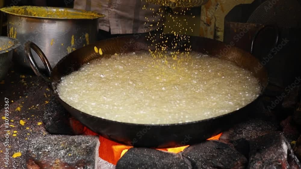 Indian street food. Boondi or Bundiya is an Indian dessert made from ...