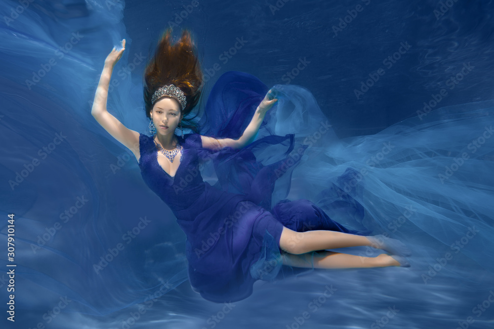 Underwater Queen. Girl mermaid. Underwater scene. A woman, a fashion ...