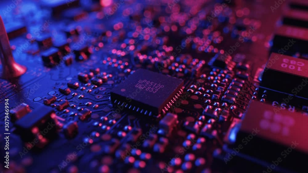 Focus on a Microchip, CPU Processor. Printed Circuit Board / Computer Motherboard with ...