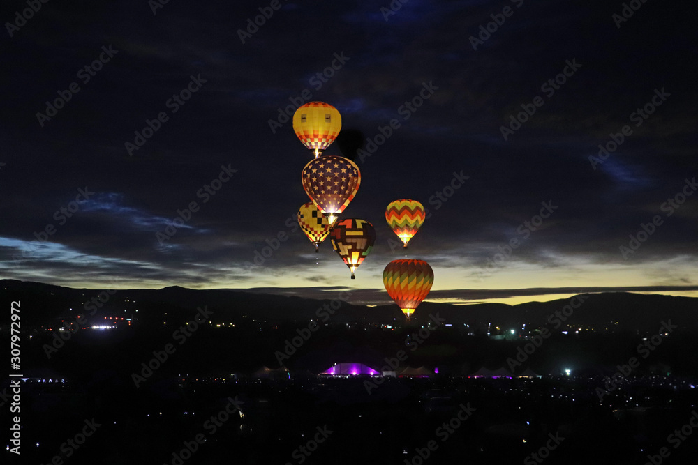 Illuminated hot air balloons at night Stock Photo | Adobe Stock
