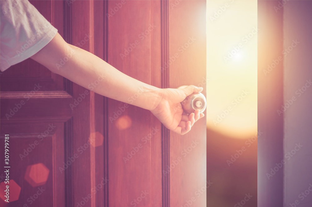 Women hand open door knob or opening the door,grand opening,Close up ...
