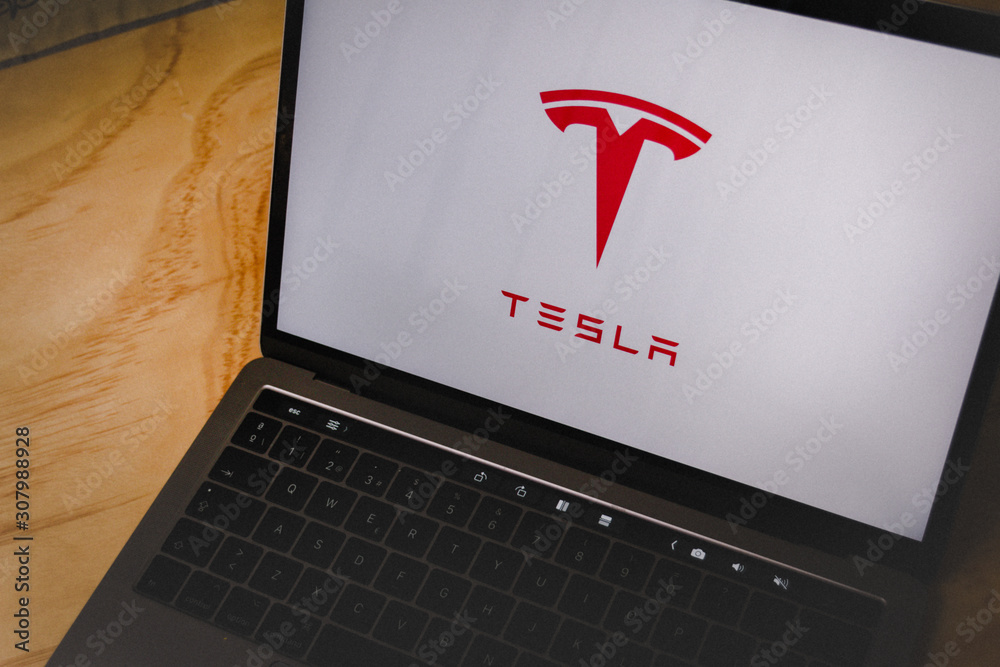 Tesla Motors logo on computer screen Stock Photo | Adobe Stock