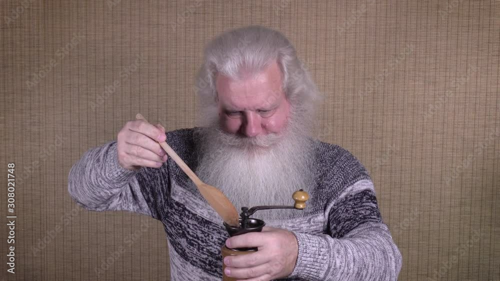 Senior thickset Caucasian happy man with splendid grey hair and beard ...