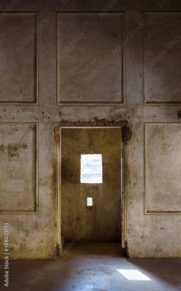 The rectangular patterns on a wall inside the ancient Raja Mahal palace ...