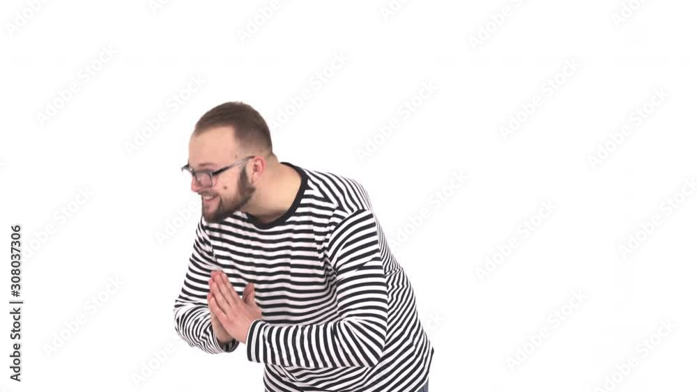 Vídeo do Stock: Caucasian guy with beard showing hand gesture of east ...