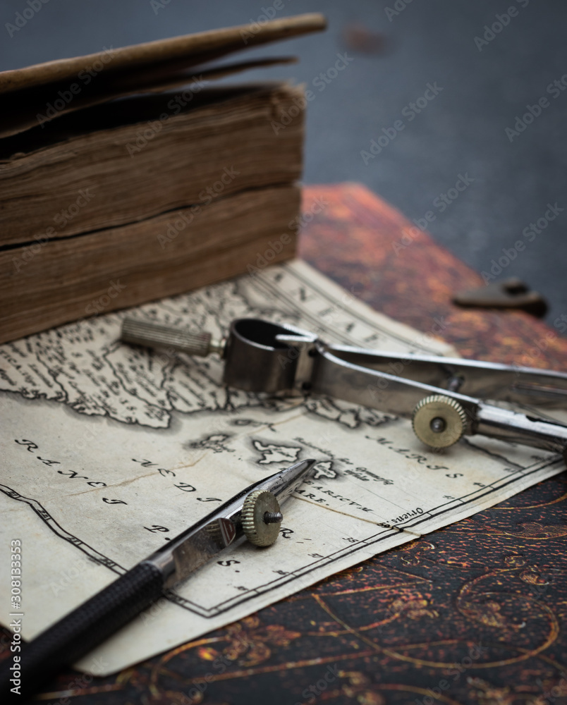 Old vintage Calipers and ink pen on a map page of the Mediterranean ...