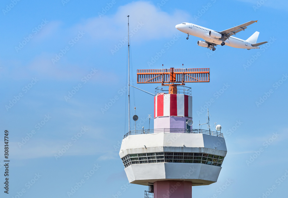 Radar air traffic control tower in international airport while airplane ...