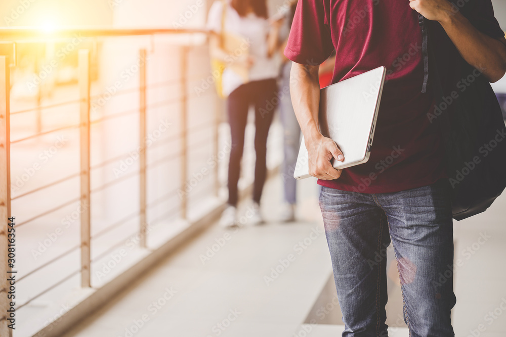 Education concept - Teens in the university and modern technology ...