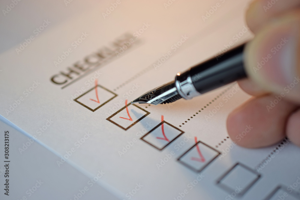 Foto de Checklist concept - checklist box with red checkmark, paper and ...