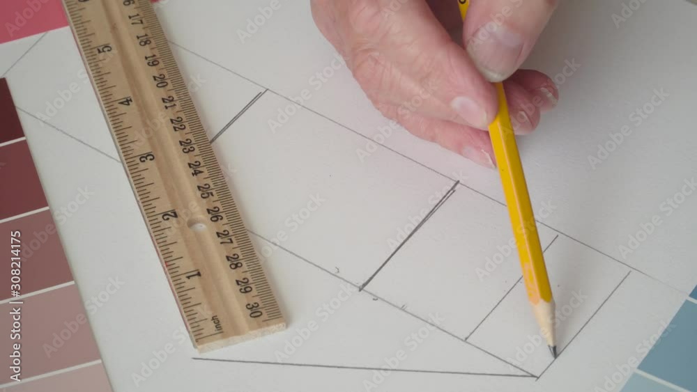 Ruler,color swatches and pencil used to create and draw a home on an ...