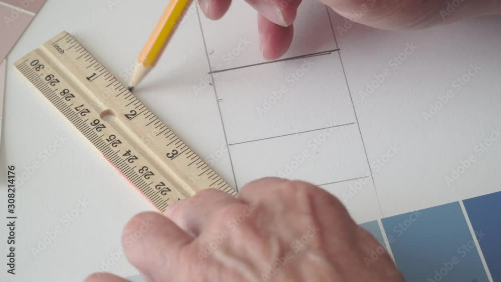 Ruler,color swatches and pencil used to create and draw a home on an ...