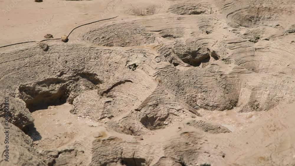 Detailed view of the crater floor with rising water and small geysers ...