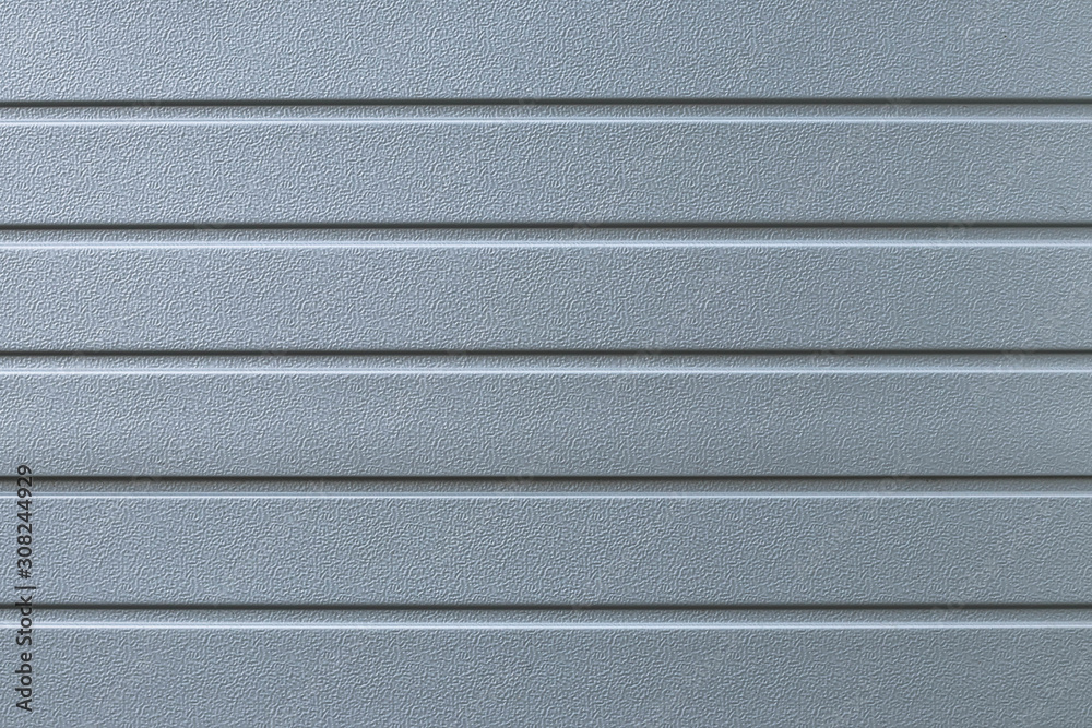 Striped gray metal surface. Texture of grey ribbed metallic cladding ...