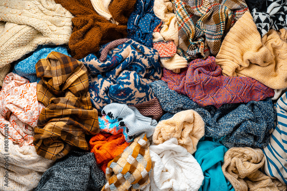 A Bunch of Different Clothes. Recyclable Textile Background. Sorting at ...