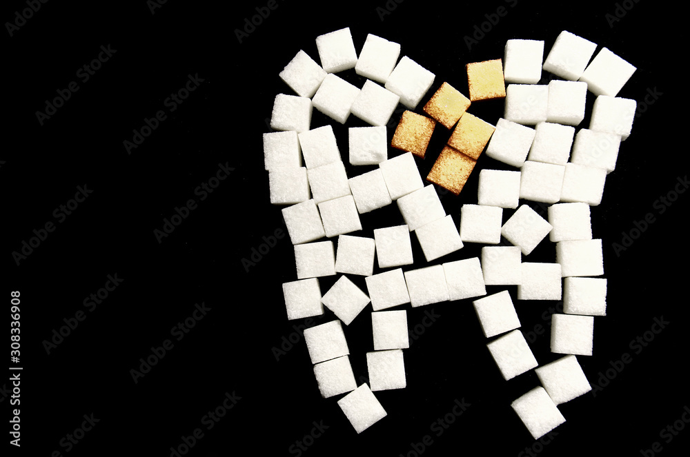 the carious tooth of sugar cubes of refined sugar, preventing tooth ...